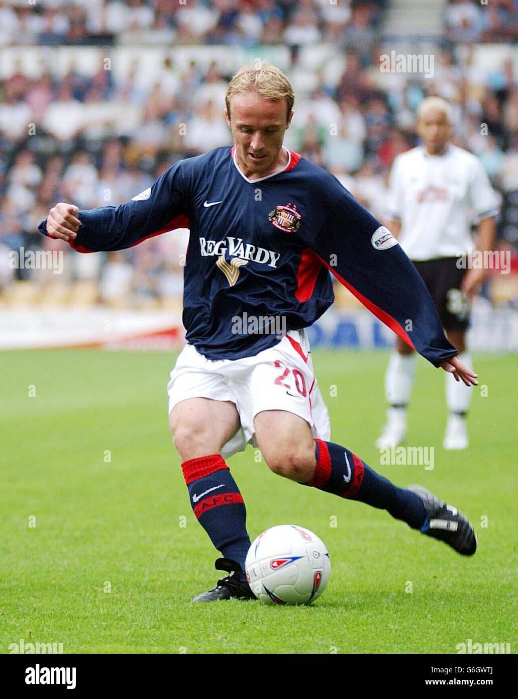 Football action thomas butler hi-res stock photography and images - Alamy