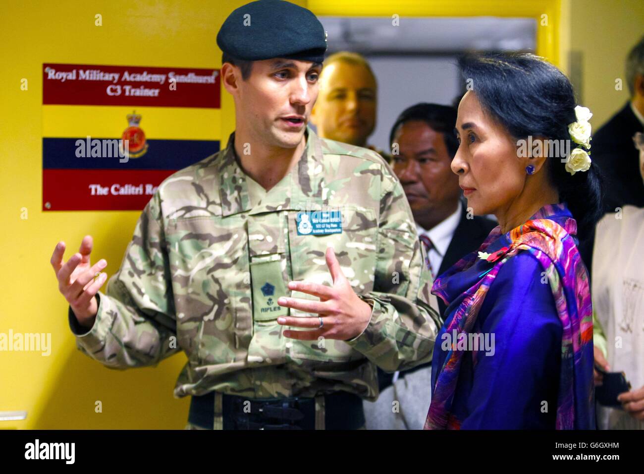 Burmese opposition leader Aung San Suu Kyi is shown a simulation of a ...