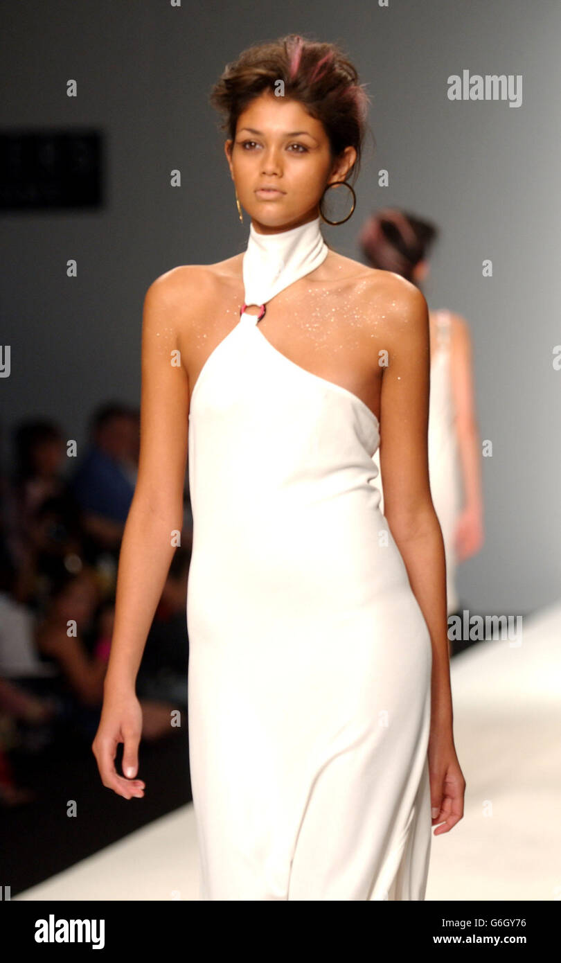 Fashion model modelling 3 4 three quarter length catwalk hi-res stock ...