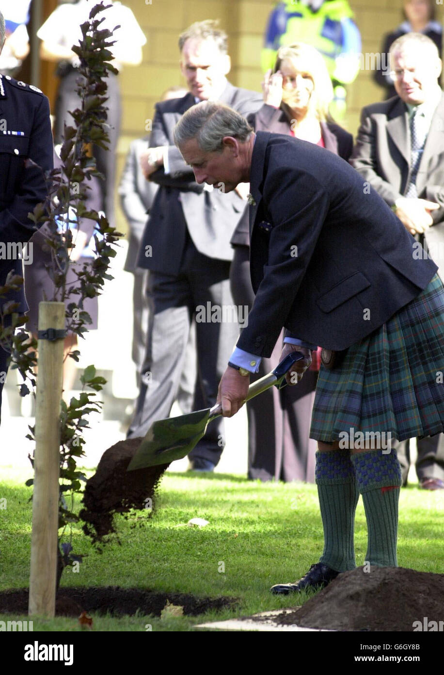 The Prince of Wales plants a tree to commemorate his visit to the ...