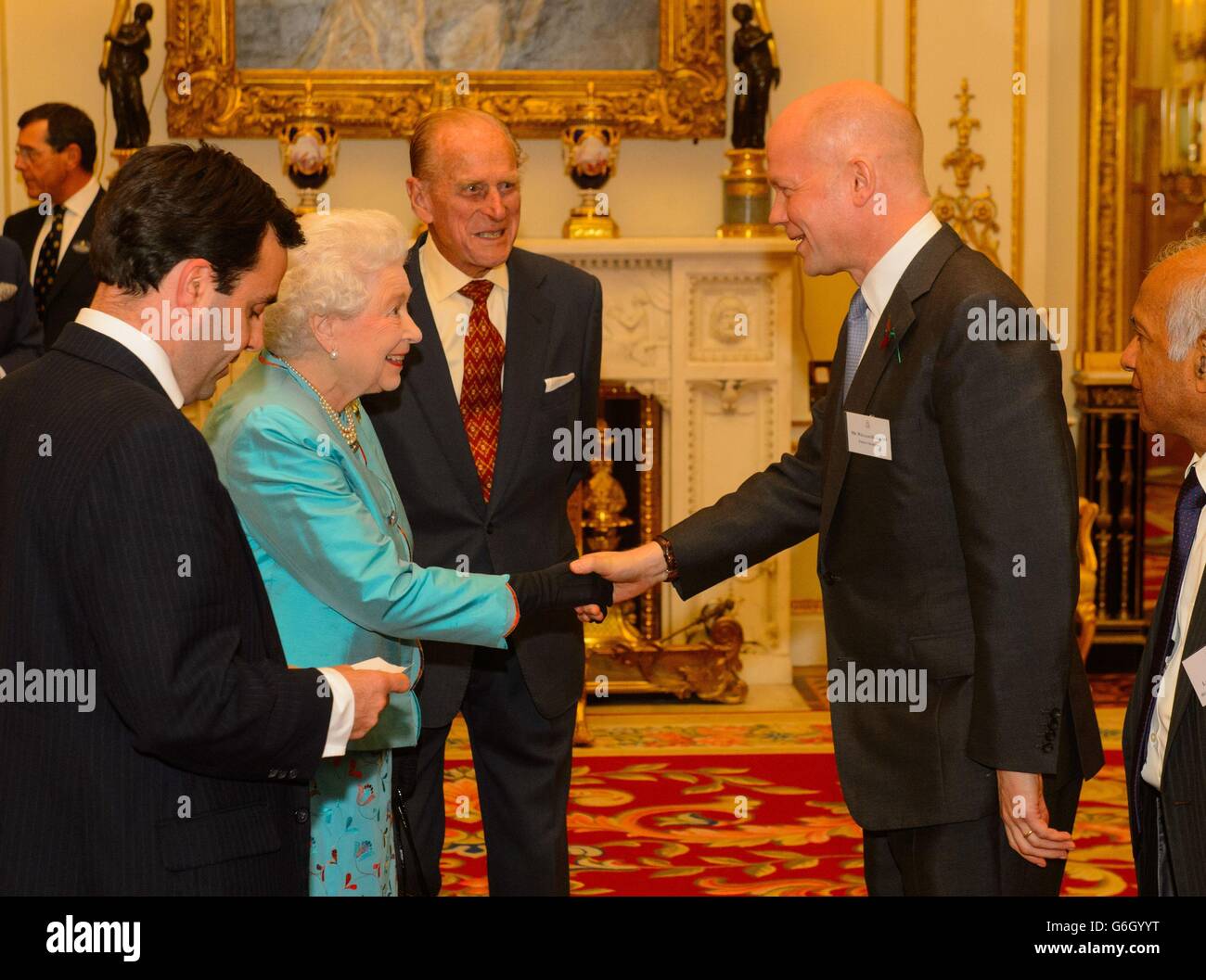 Queen Elizabeth II greets Foreign Secretary William Hague at a ...