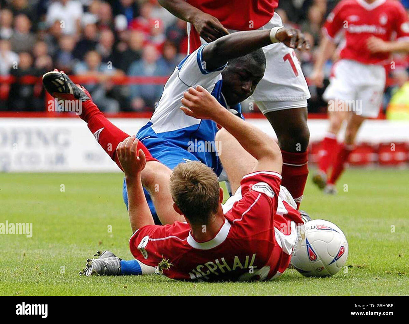 Forest's Stephen McPhail tangles with Derby's Pablo Mills, during their ...