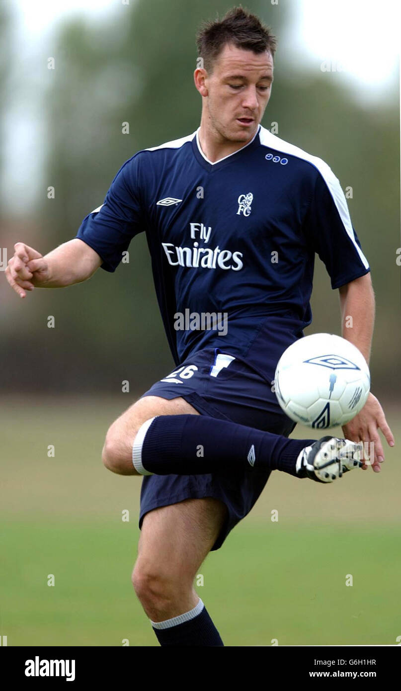 Chelsea's John Terry warms up at their training ground in Harlington ...