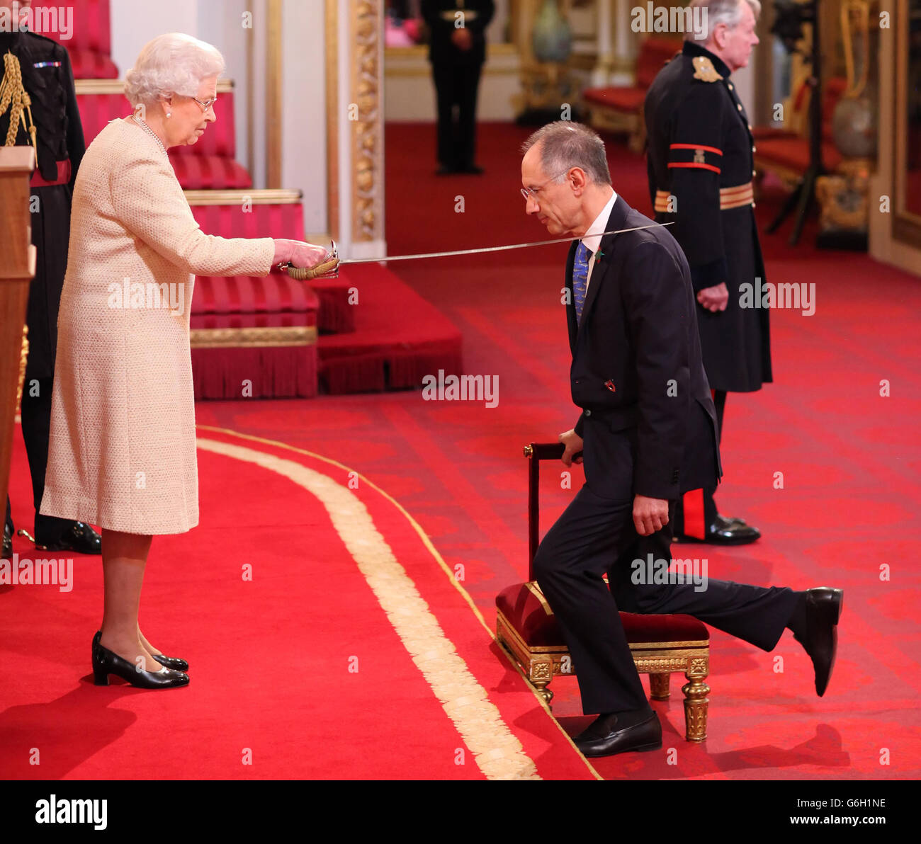 Knighted by queen buckingham palace hi-res stock photography and images ...