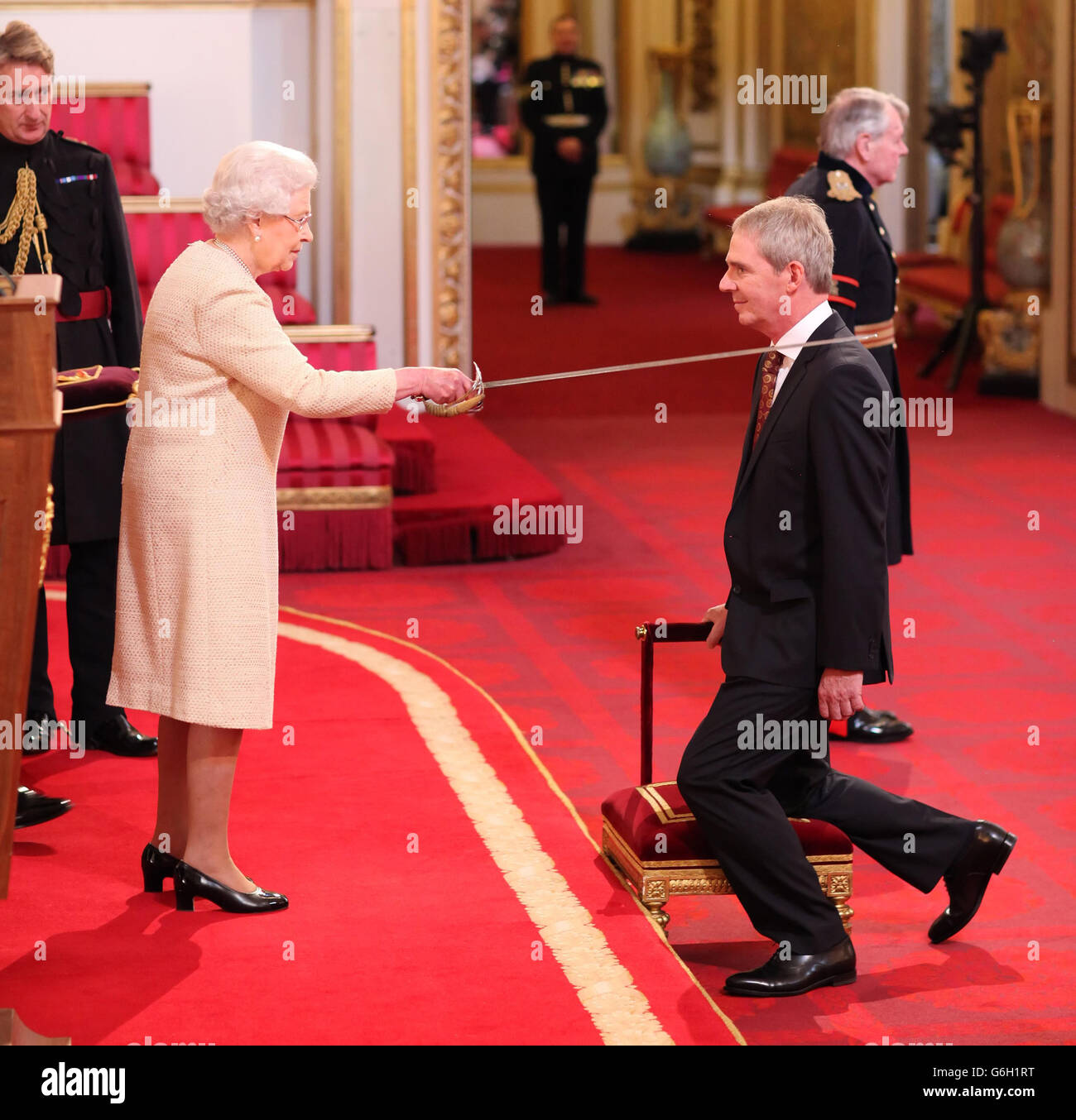 Knighted by queen buckingham palace hi-res stock photography and images ...