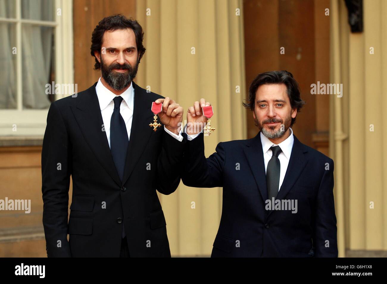 Investiture ceremony at Buckingham Palace left Edward Barber right Jay ...