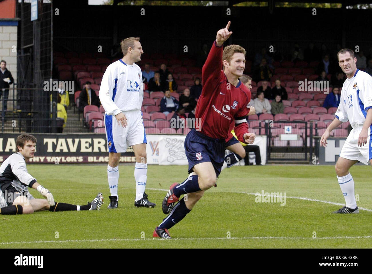 York City's Lee Bullock (second right) turns to celebrate scoring the ...