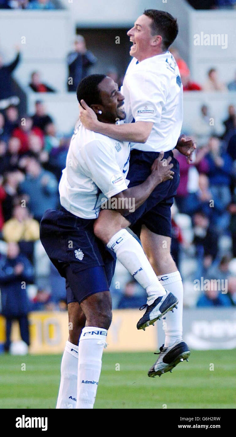 Preston Striker Ricardo Fuller (left) is joined in celebration of his ...
