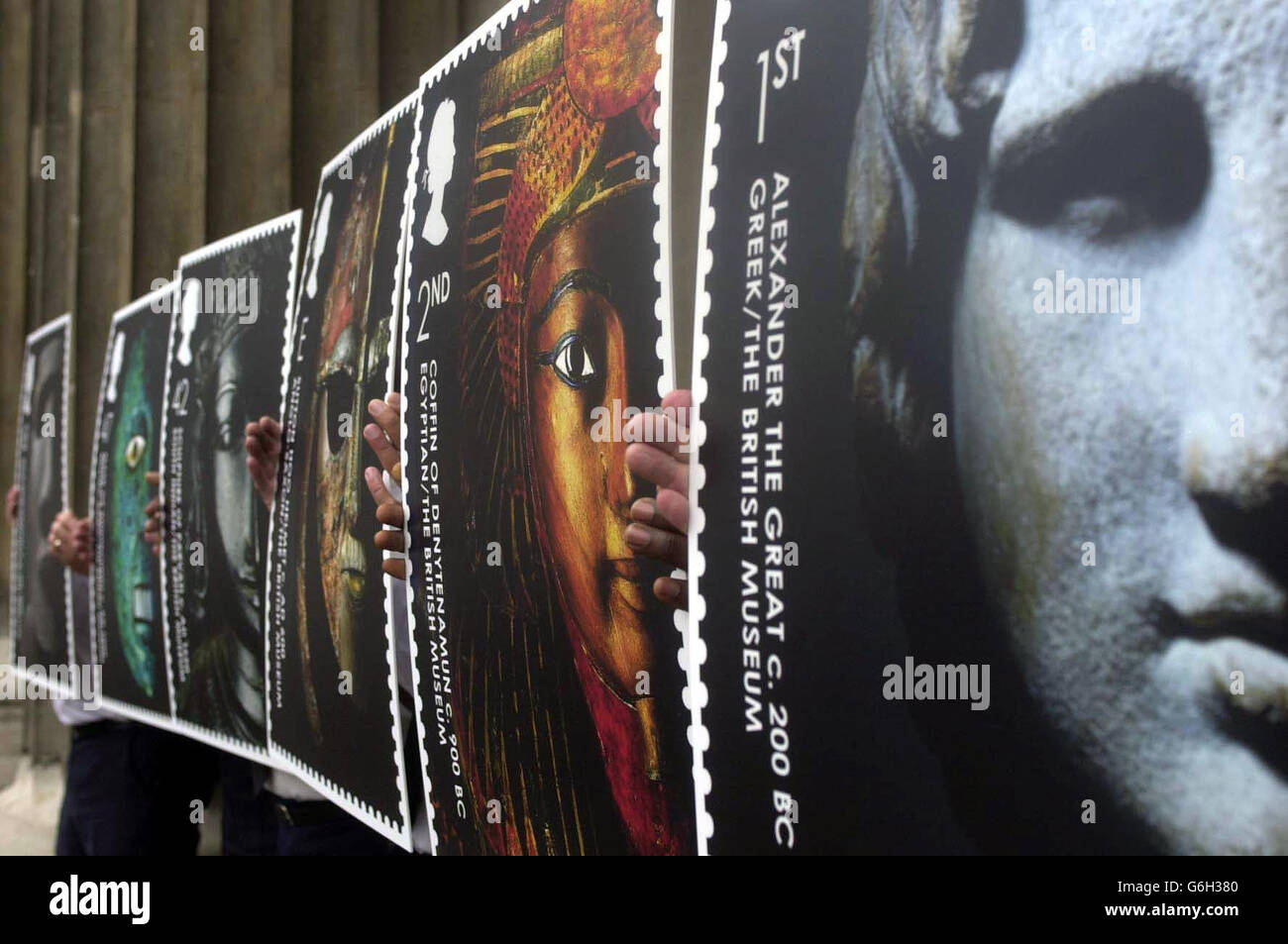 Six members of staff at the British Museum in central London display ...