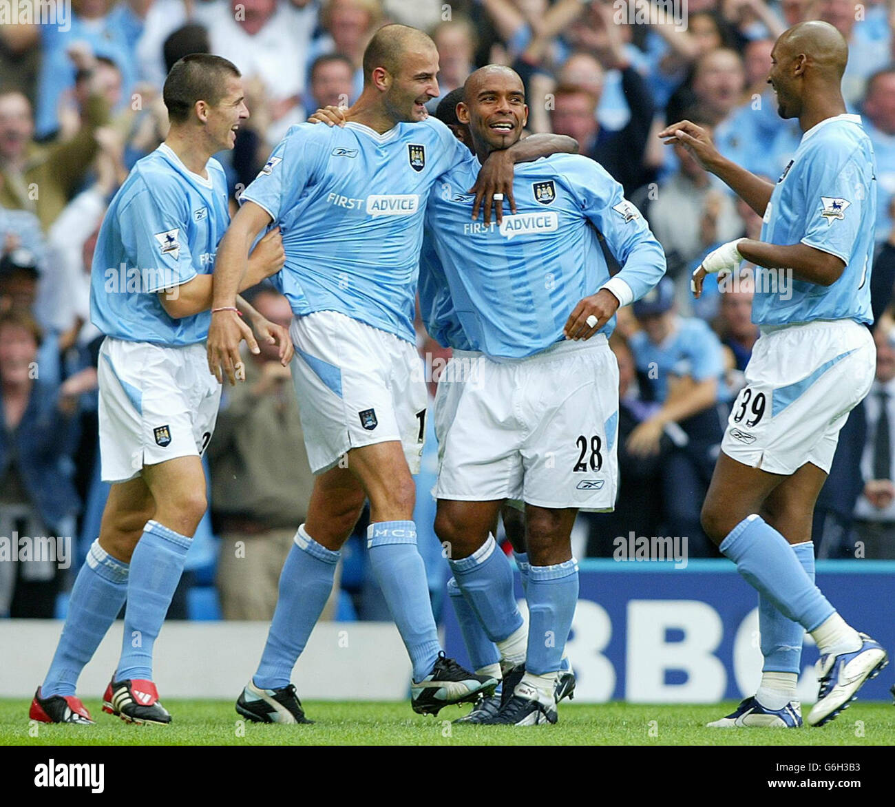 Manchester City's Trevor Sinclair (28) celebrates Arsenal's Lauren ...