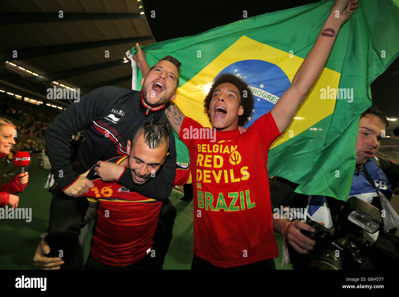 Belgium's Axel Witsel (right), Steven Defour (centre) and Dries Mertens ...