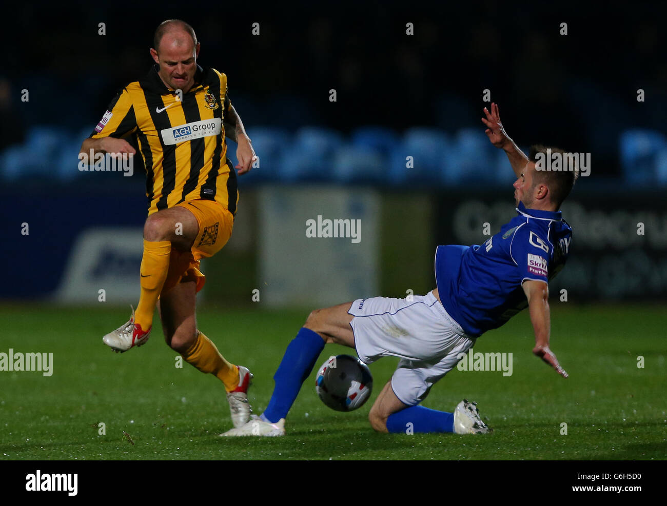 Southport's Jamie Milligan and Macclesfield Town's Chris Holroyd (right ...
