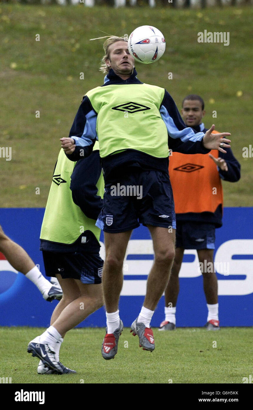 England captain, David Beckham, controls the ball on his chest during ...