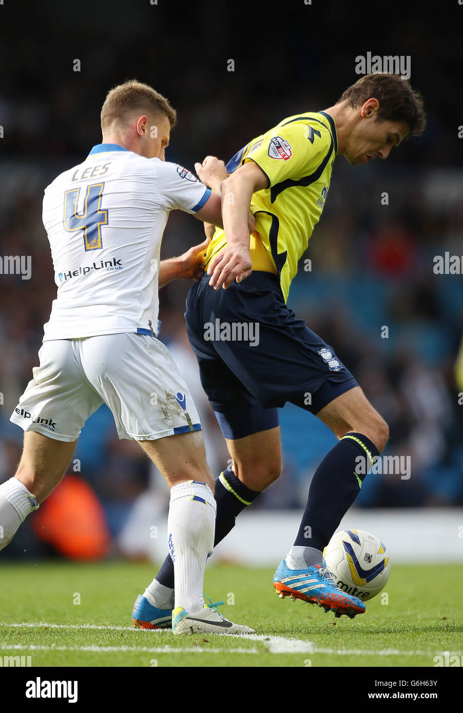 Leeds uniteds tom lees and birmingham citys nikola zigic hi-res stock ...