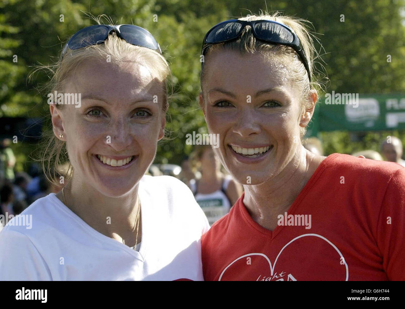 Paula Radcliffe (left) celebrates with model Nell McAndrew, after ...