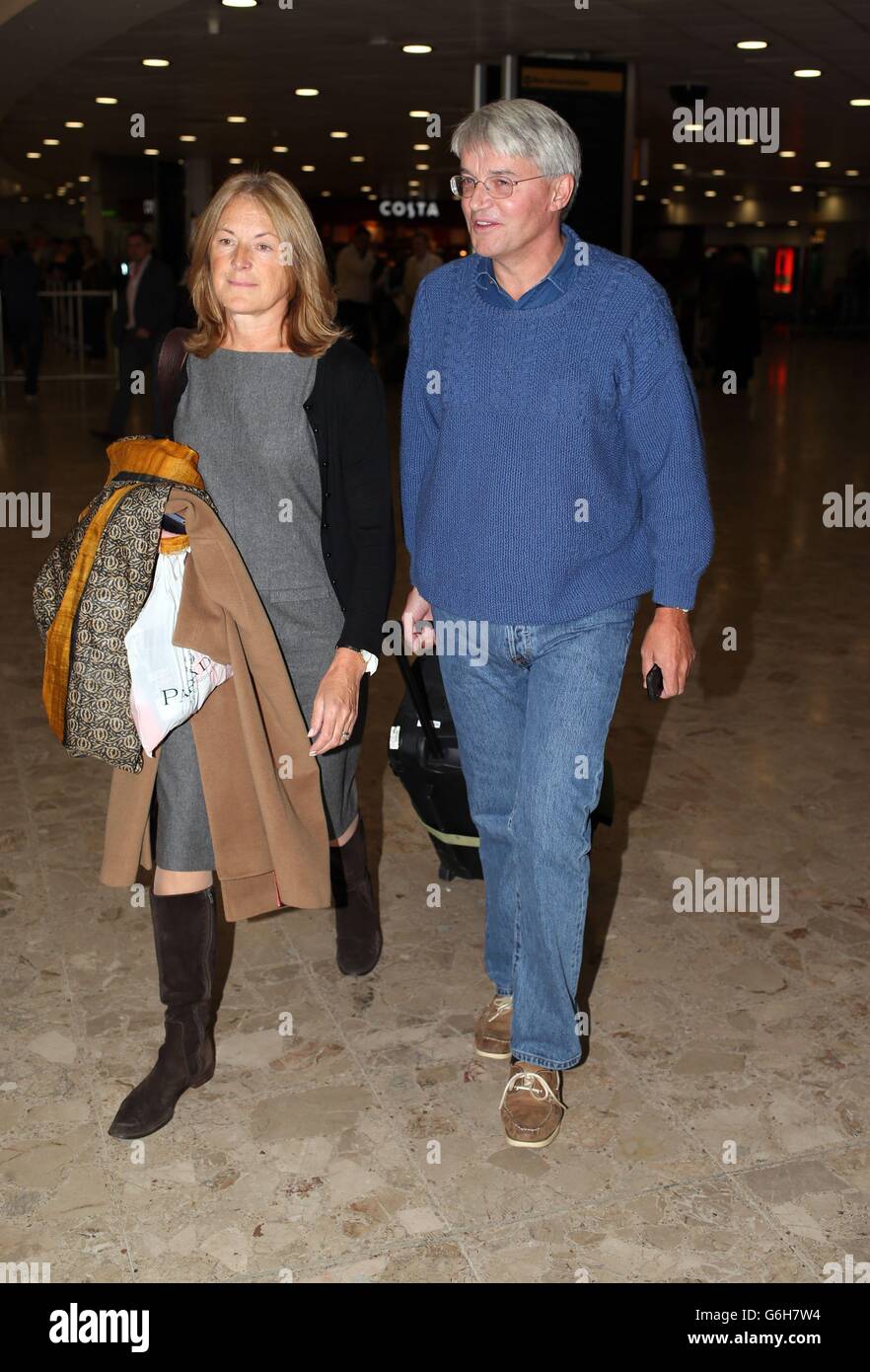 Andrew Mitchell and his wife Sharon at Terminal 1 in Heathrow airport ...