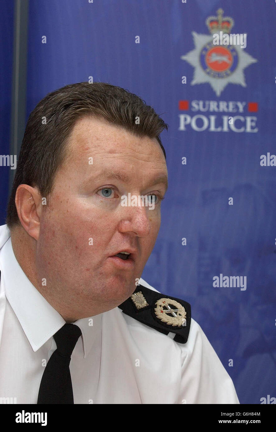 Surrey Police Deputy Chief Constable Bob Quick speaks to the media in ...