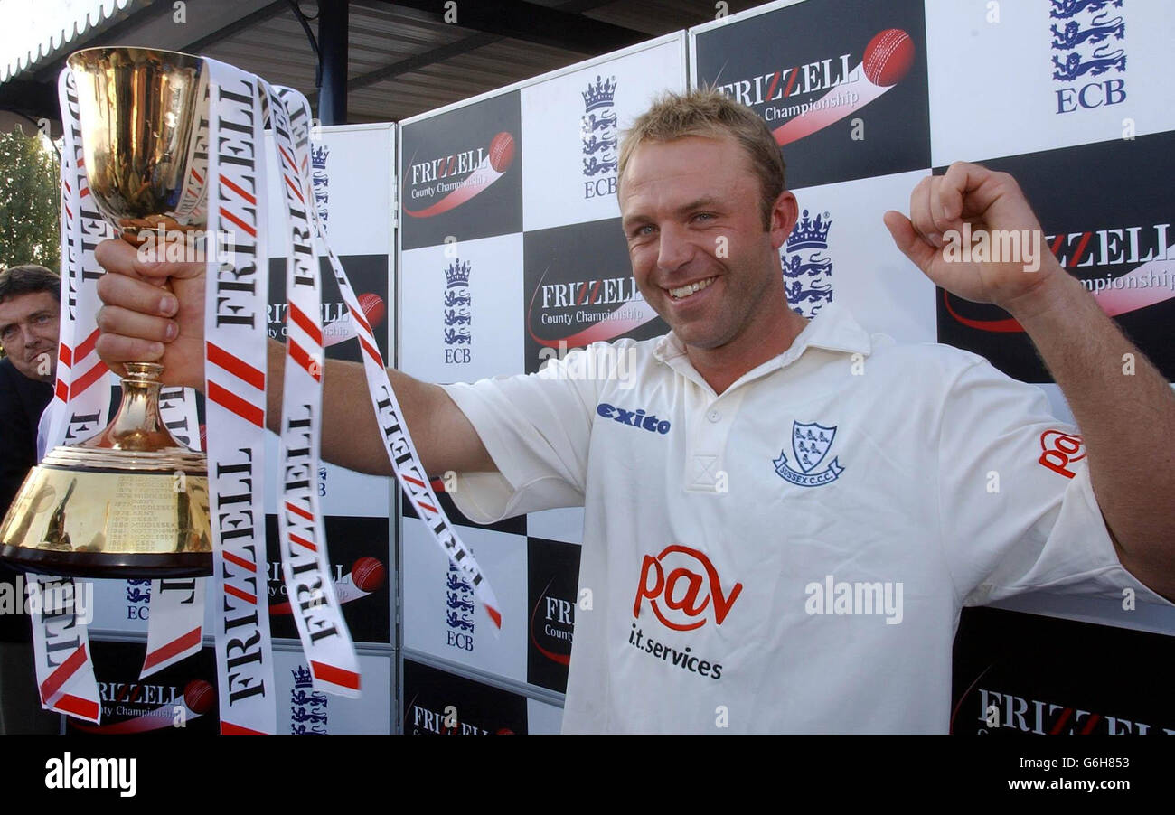 Chris Adams lifts the cup. Sussex captain Chris Adams lifts the Frizell ...