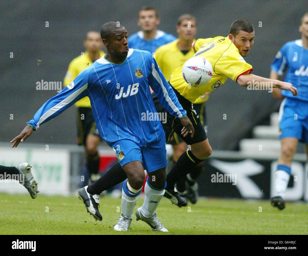 Ellington wins the ball from Jamie hand Stock Photo - Alamy