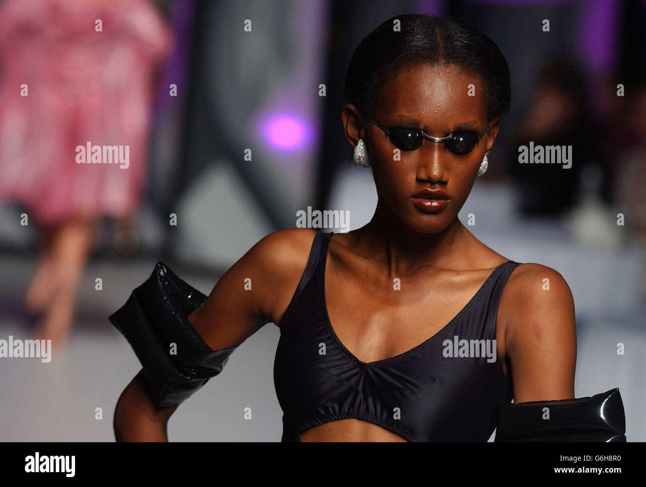 A model wears a creation by Frost French during their Spring/Summer ...