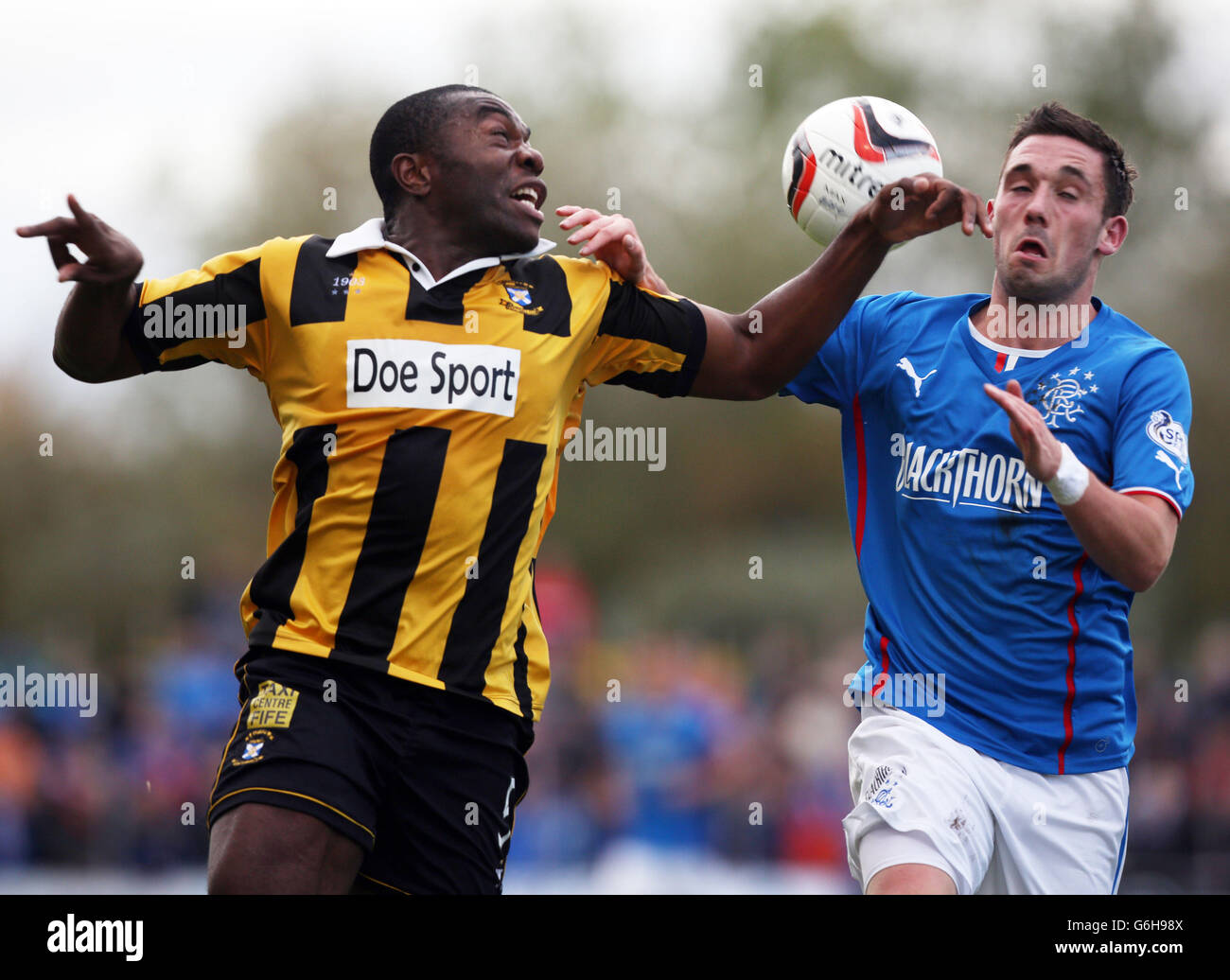 Rangers Lee Wallace holds off East Fife Joe Mbu during the Scottish ...