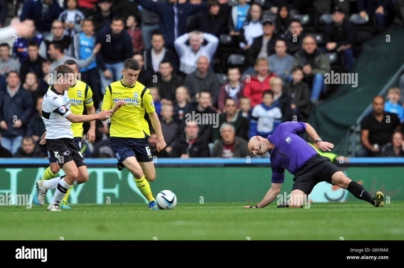 Derby County's Craig Bryson (left) and Birmingham City's Callum Reilly ...