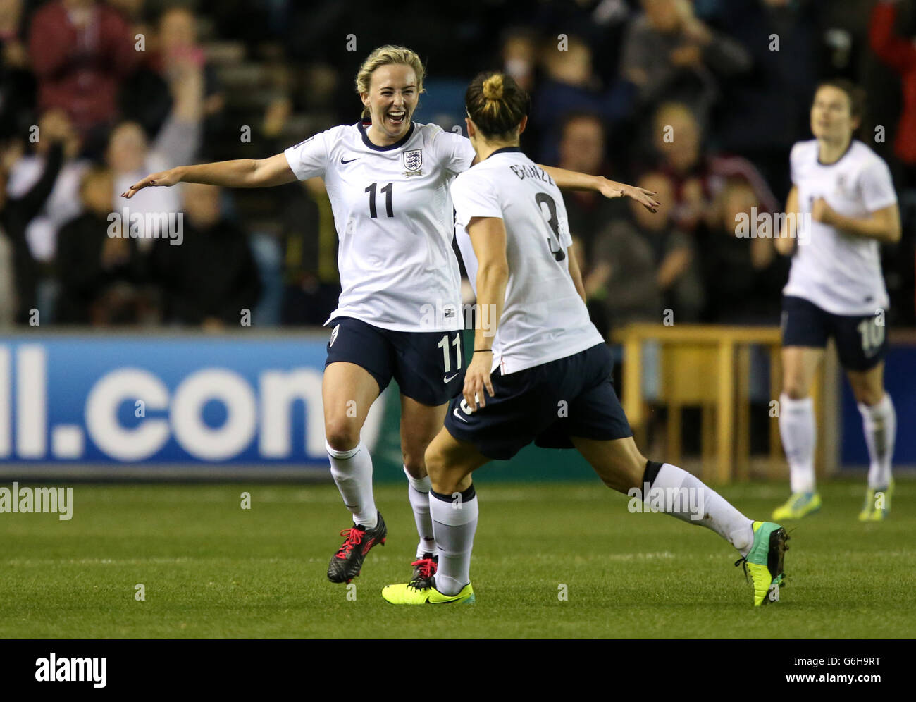 England's Toni Duggan (left) celebrates scoring their second goal of ...