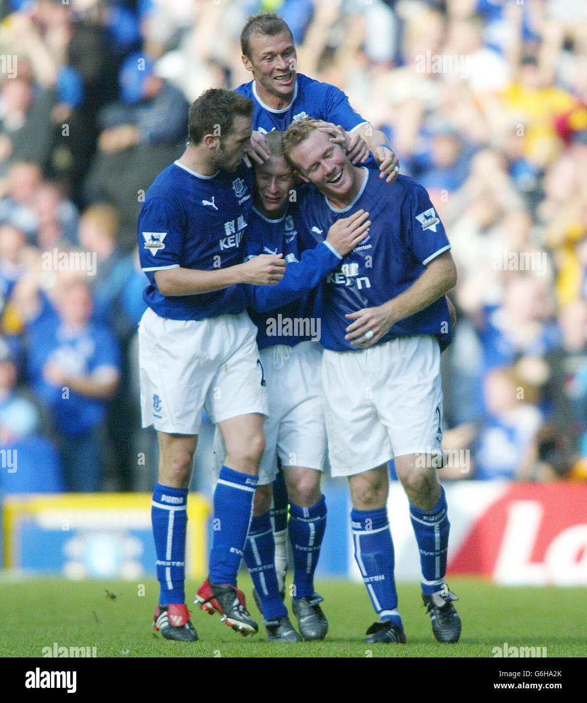 Everton's Steve Watson (right) celebrates scoring against Leeds United ...