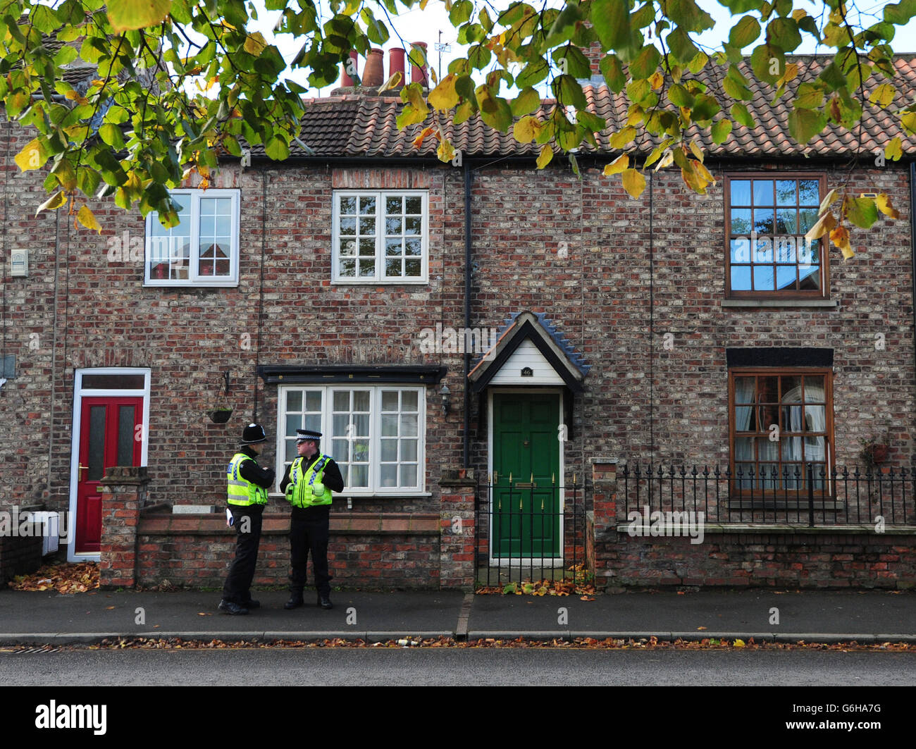 Police officers outside the home of missing university chef Claudia ...