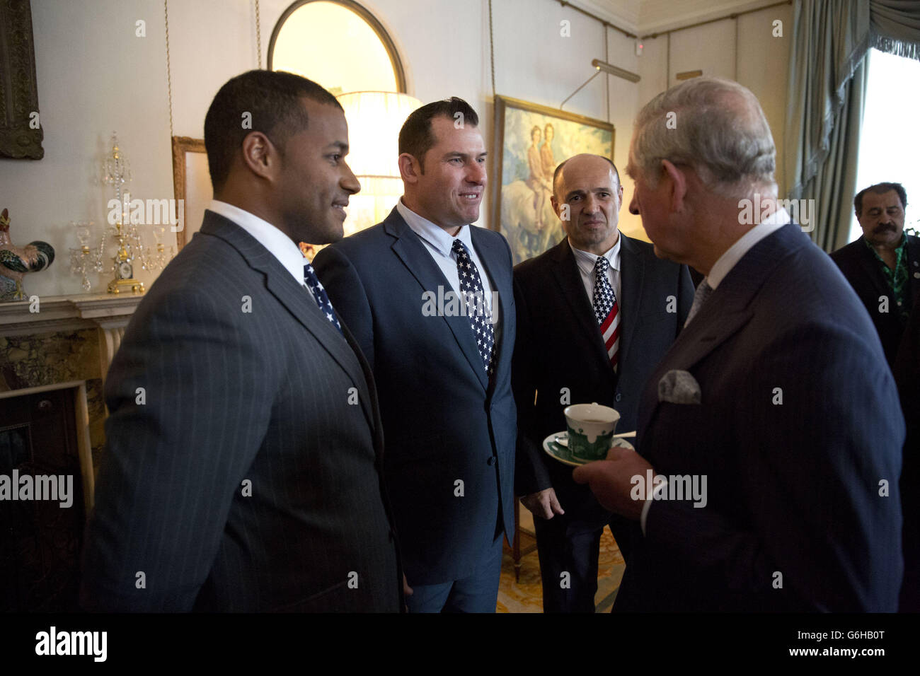 The Prince of Wales, speaks with (from left) US team ambassador Curtis ...