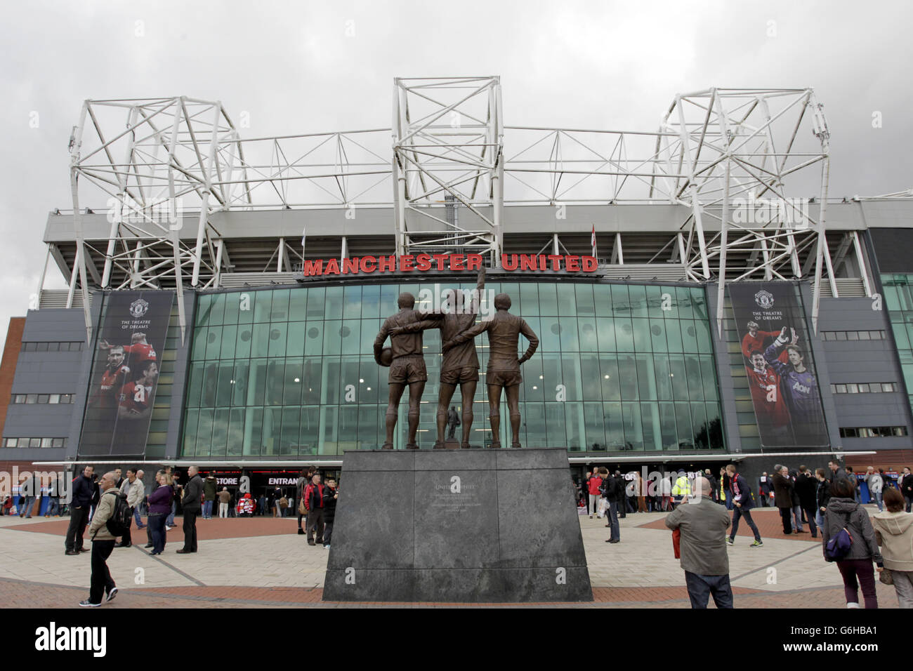 A General view of Old Trafford, The United Trinity statue of former ...