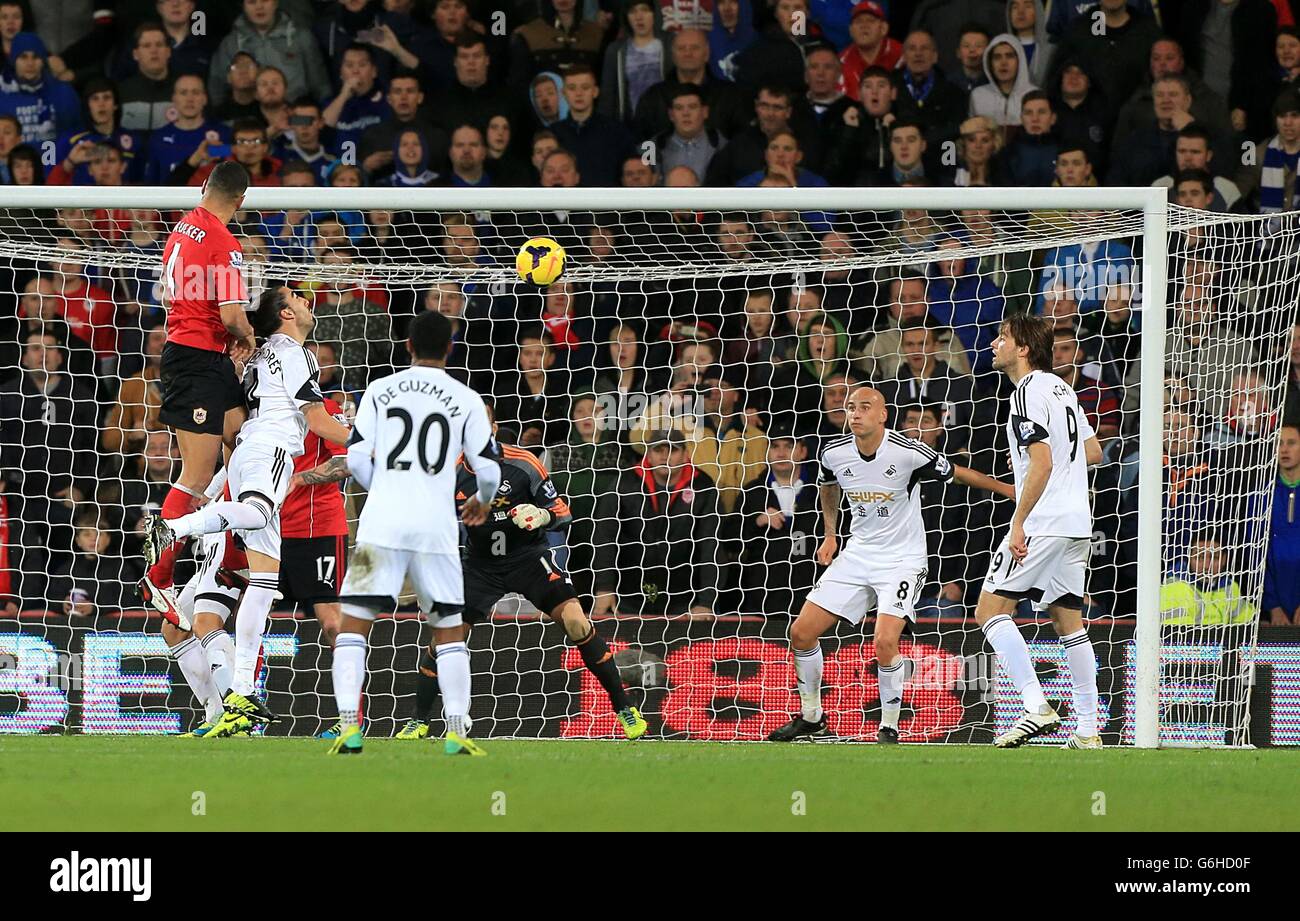 Cardiff City's Steven Caulker (left) scores his teams opening goal ...