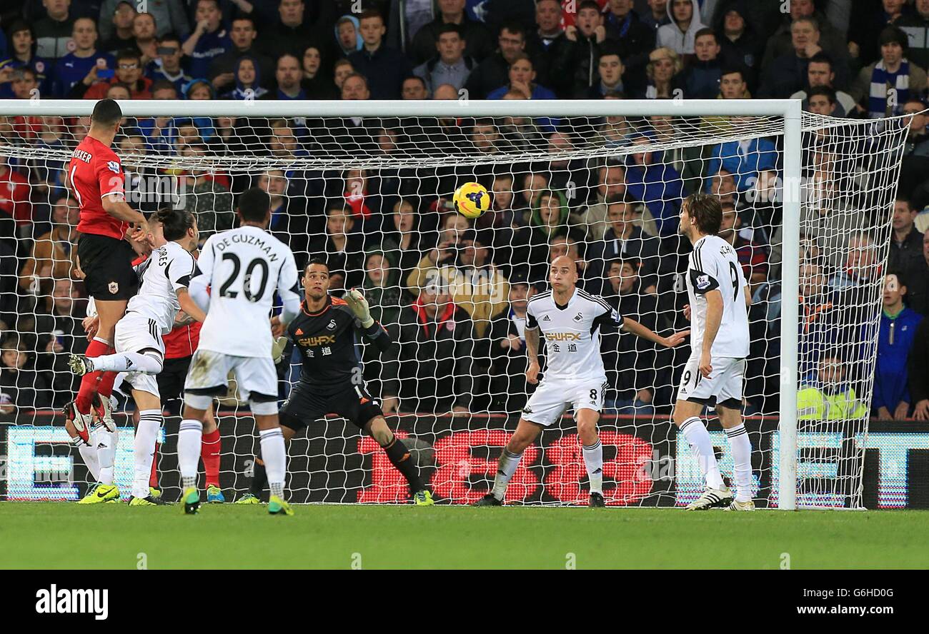 Cardiff City's Steven Caulker (left) scores his teams opening goal ...