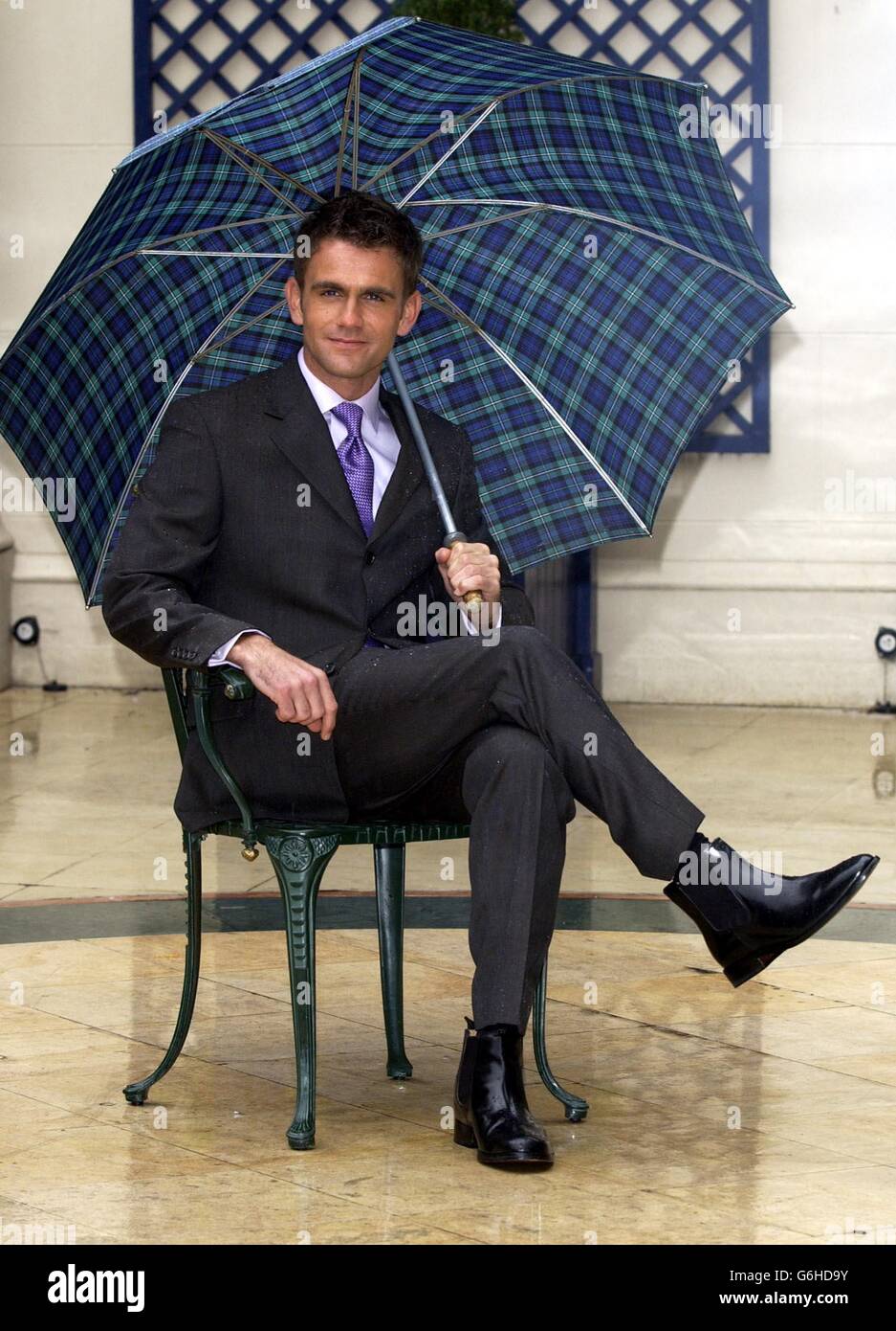 Actor Scott Maslen poses for photgraphers after he was awarded Marks ...