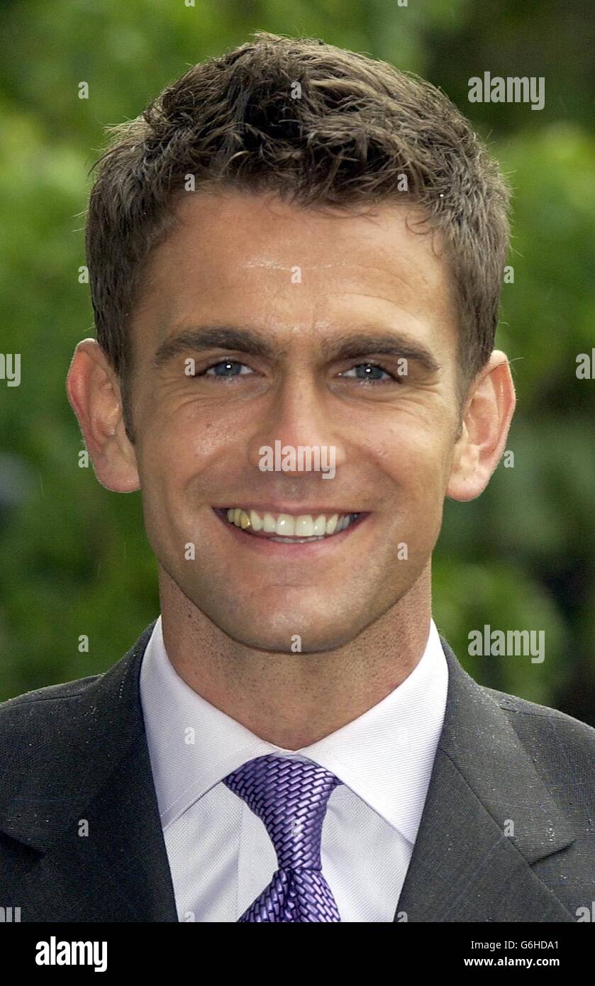 Actor Scott Maslen poses for photgraphers after he was awarded Marks ...