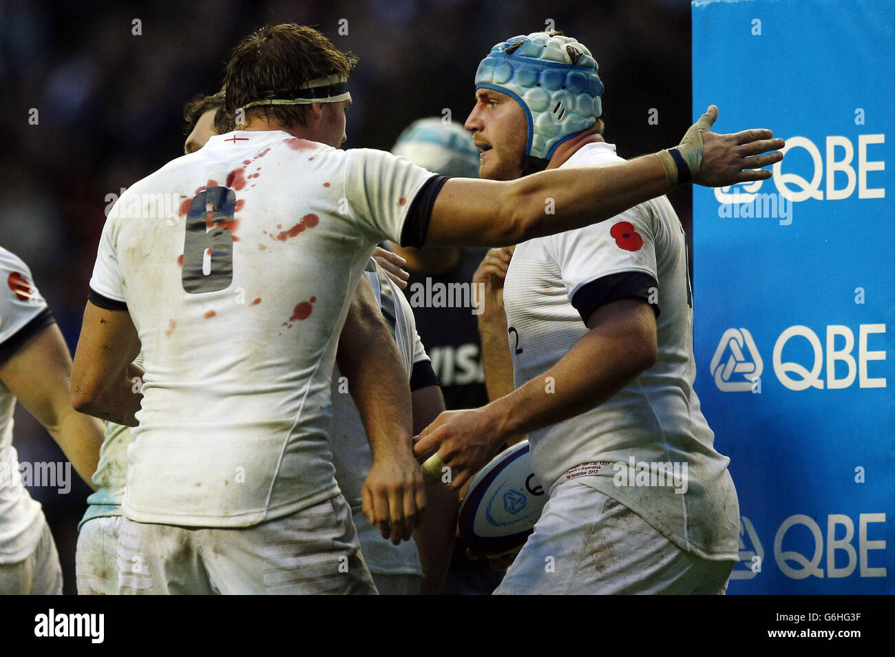 England's Ben Morgan (right) celebrates scoring England's fourth try ...