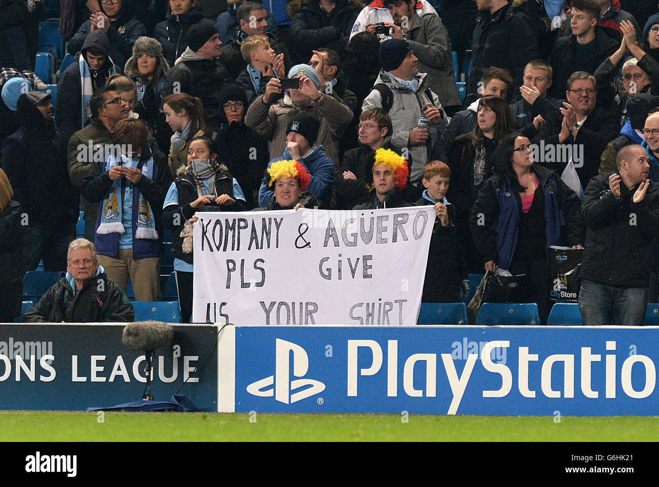 Manchester city fans hold up banner hi-res stock photography and images ...