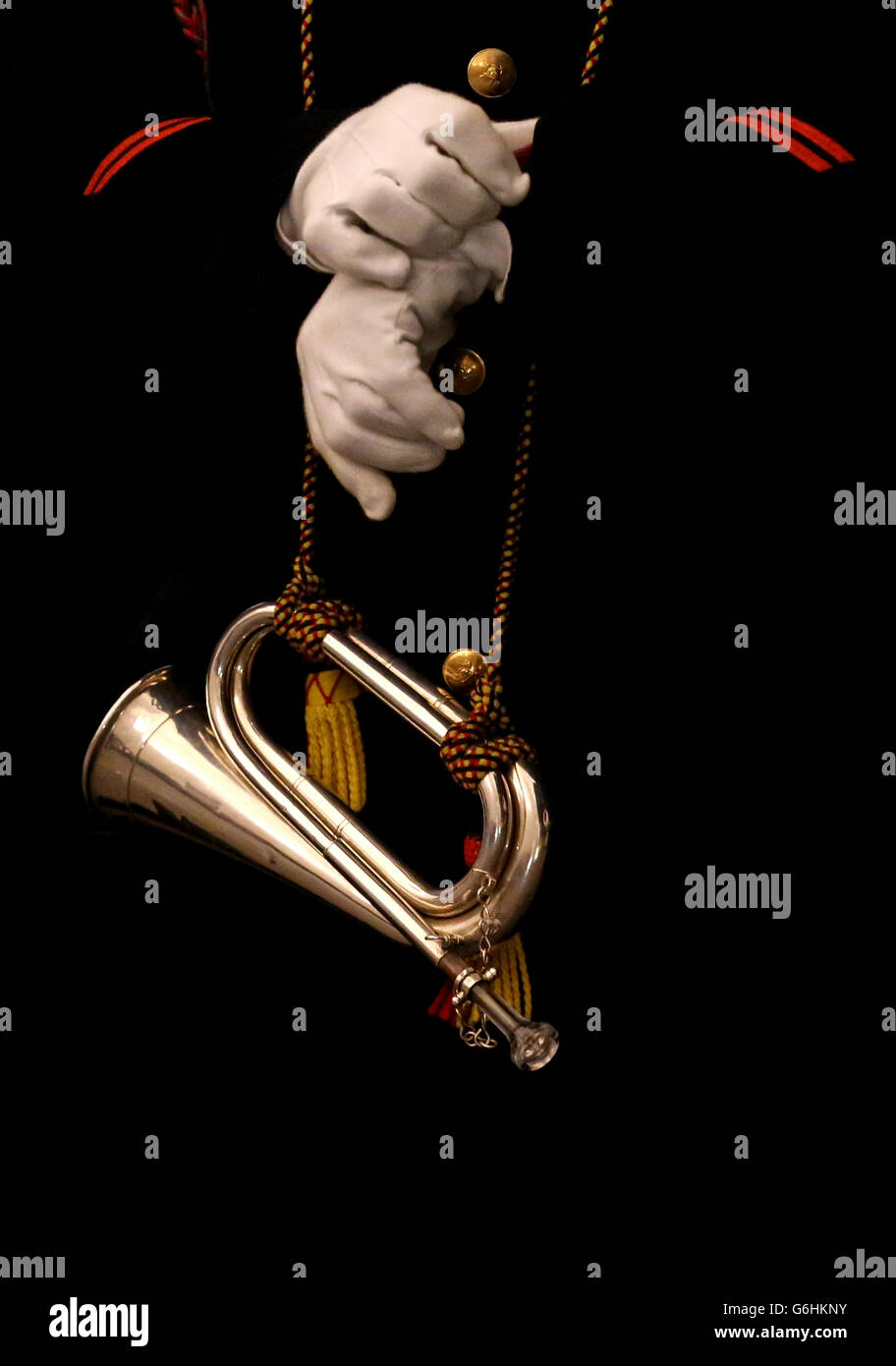 A bugal player from the Ypres Fire Service checks the time during the ...