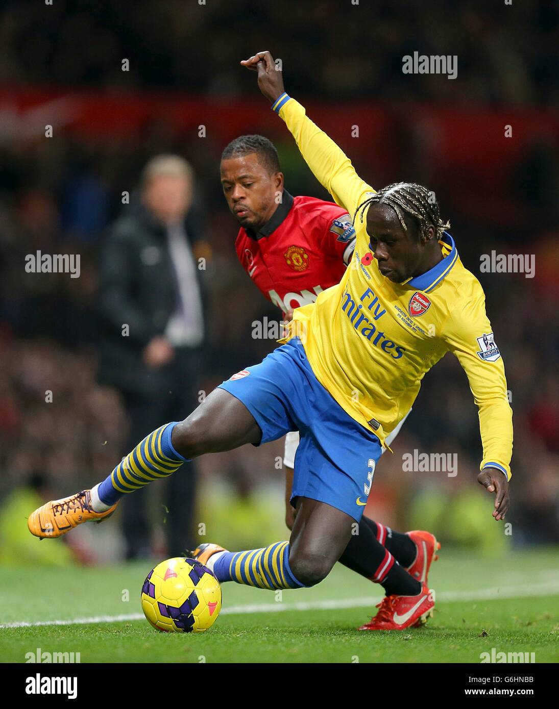Manchester United's Patrice Evra and Arsenal's Bacary Sagna (right ...