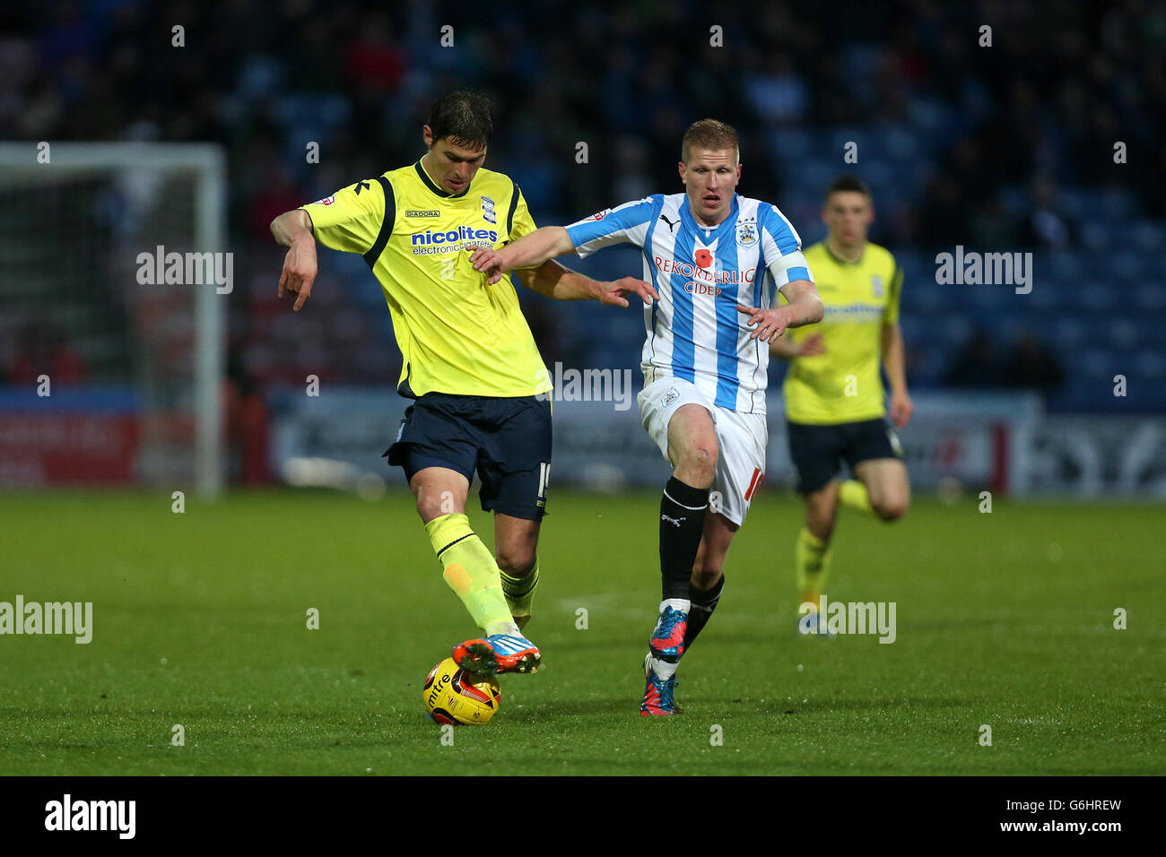 Birmingham City's Nikola Zigic and Huddersfield Town's Keith Southern ...