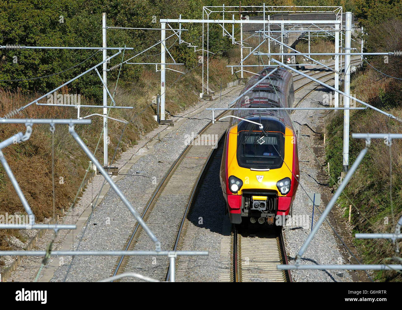 Train travels along West Coast Mainline Stock Photo - Alamy