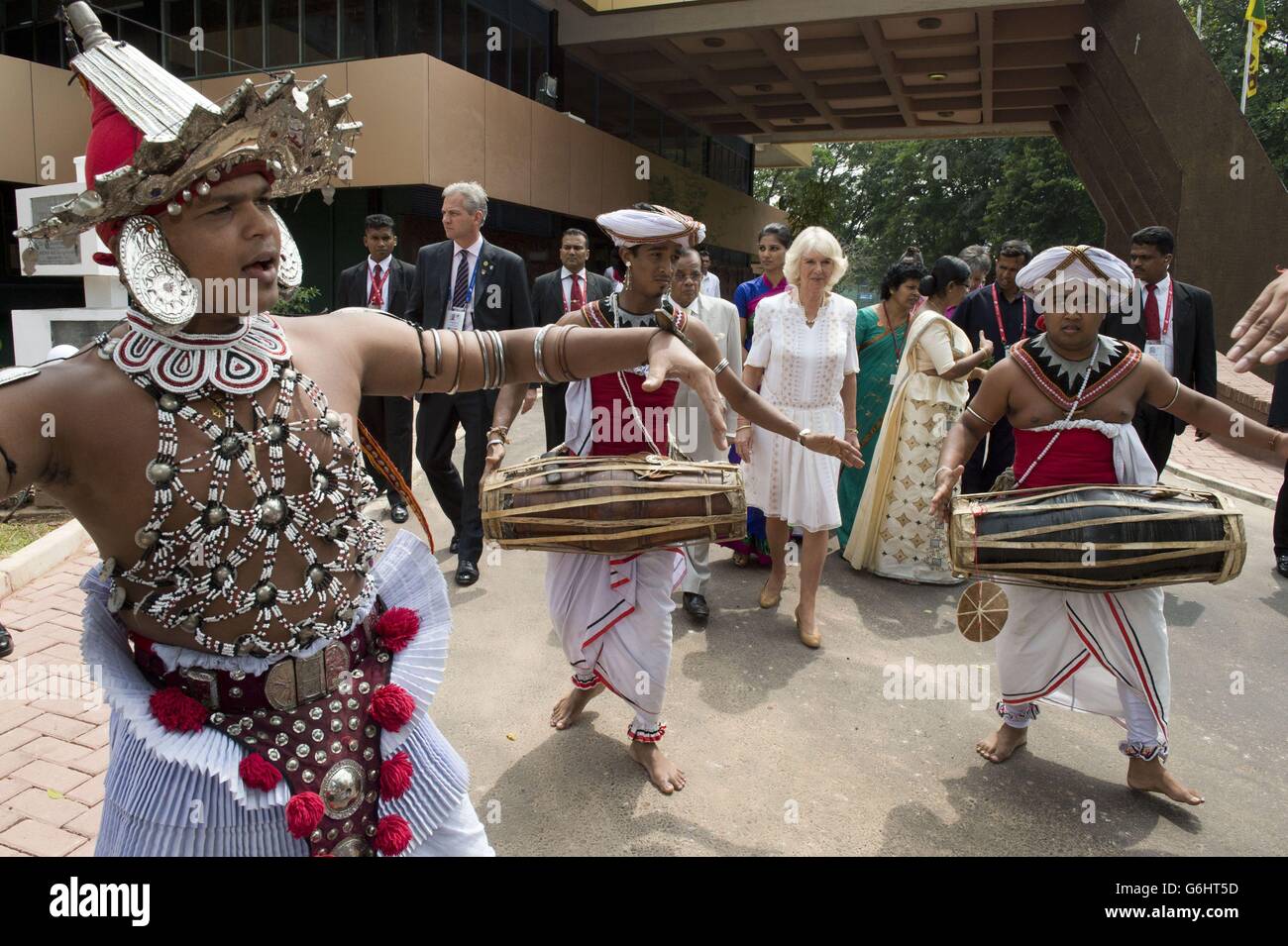 Traditional Sri Lankan drummers greet the Duchess of Cornwall as she ...