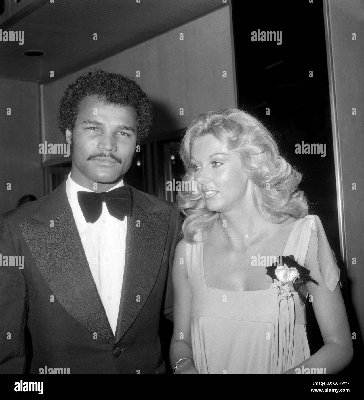 Boxer John Conteh escorting Veronica Smith at the Gala Premiere of ...