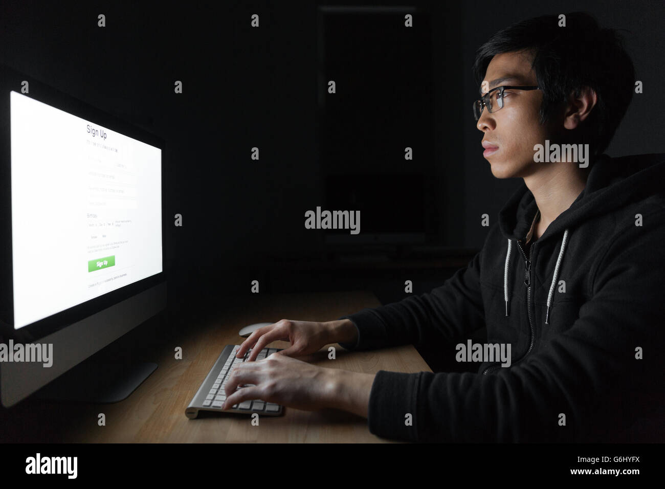 Computer dark room man hi-res stock photography and images - Alamy