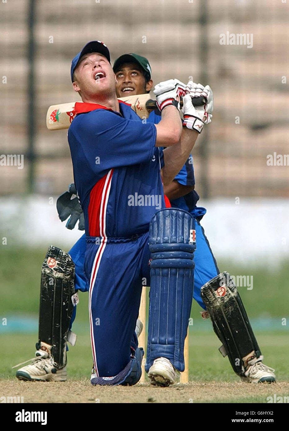 Wicket keeper Dhiman Ghosh watches England Andrew Flintoff smash the ...