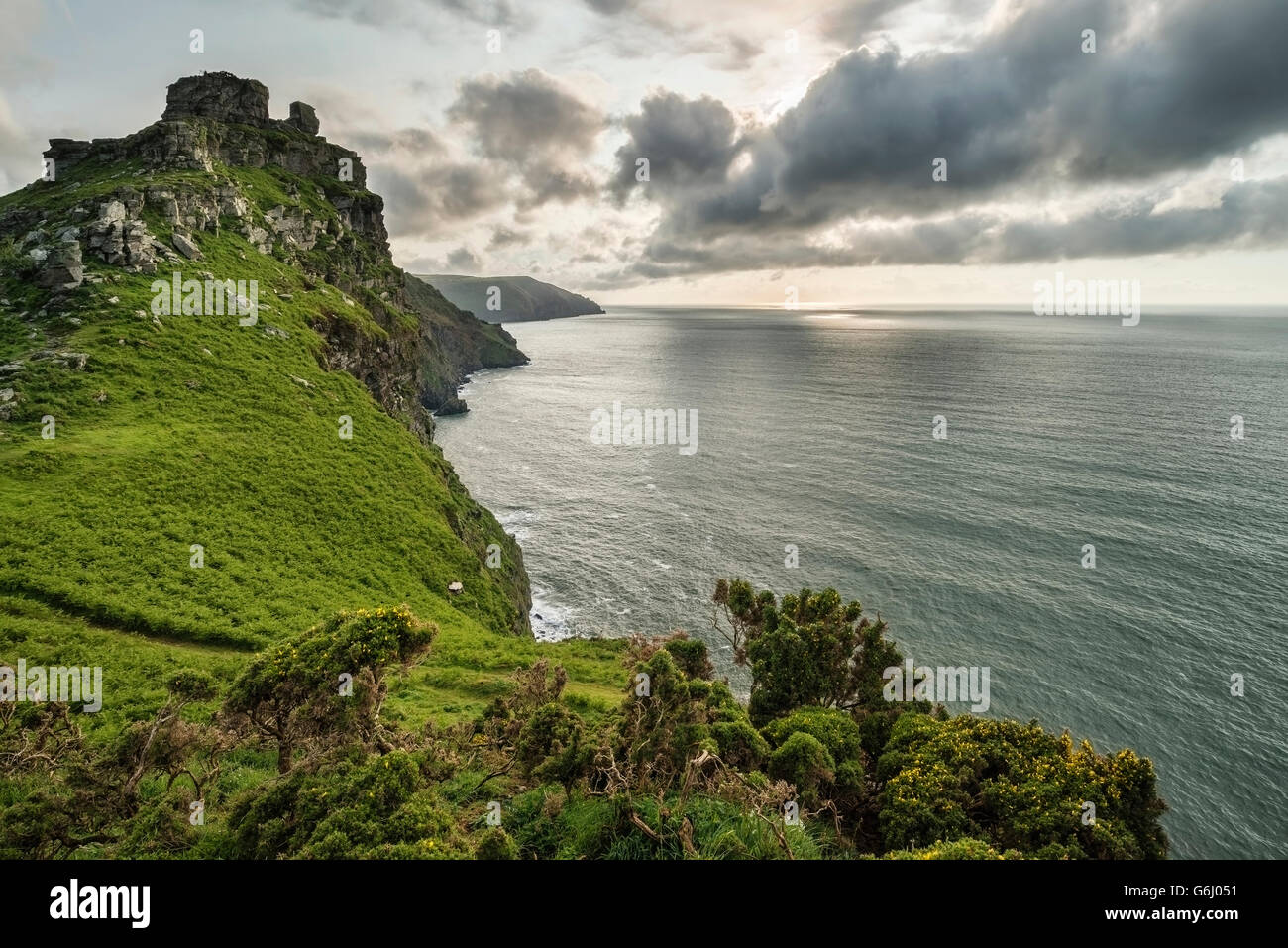Beautiful sunset landscape image of Valley of The Rocks in Devon ...