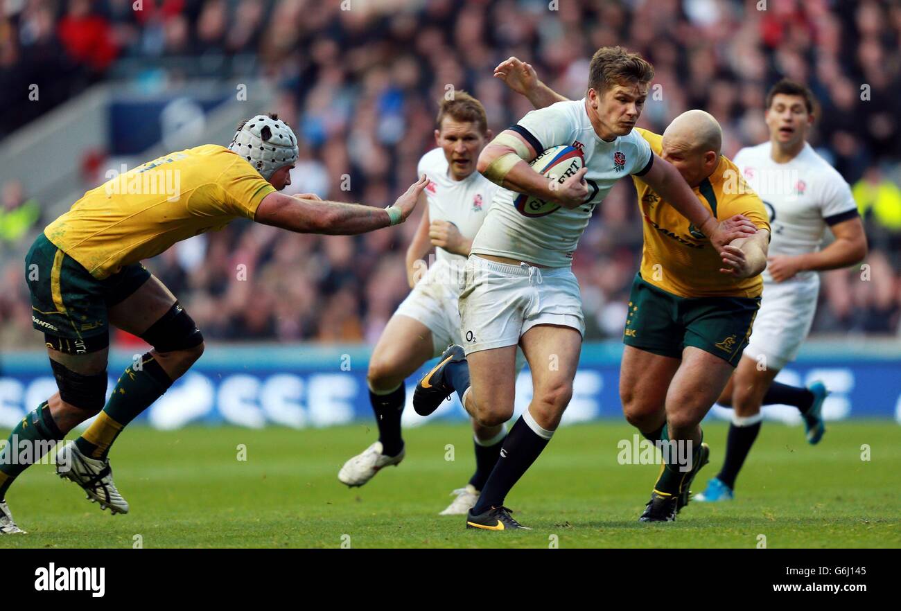 England's Owen Farrell breaks through to score their second try during ...