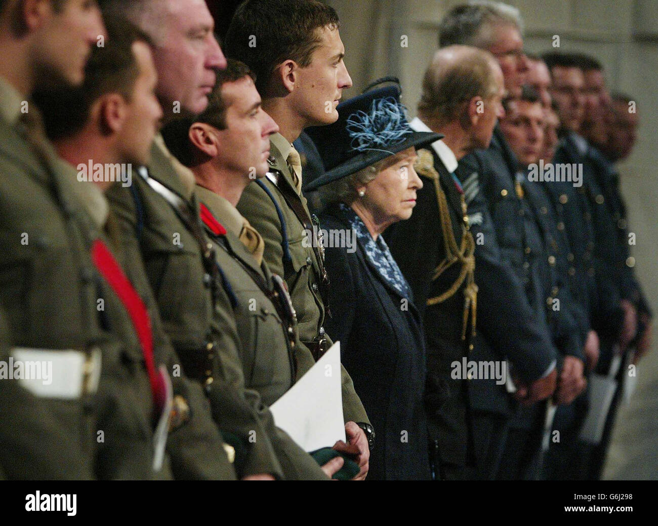 Britain's Queen Elizabeth II (centre) and her husband the Duke of ...