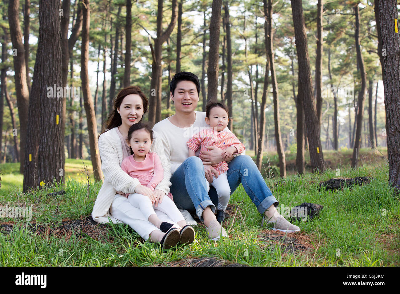 Happy asian family sitting on hi-res stock photography and images - Alamy