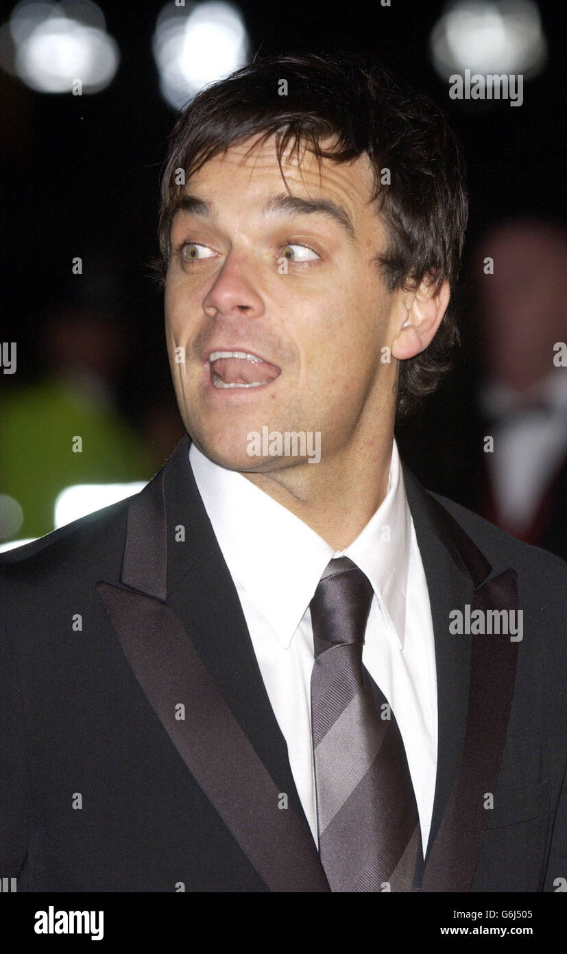 NO MERCHANDISING. Singer Robbie Williams arrives for the "Fashion Rocks ...